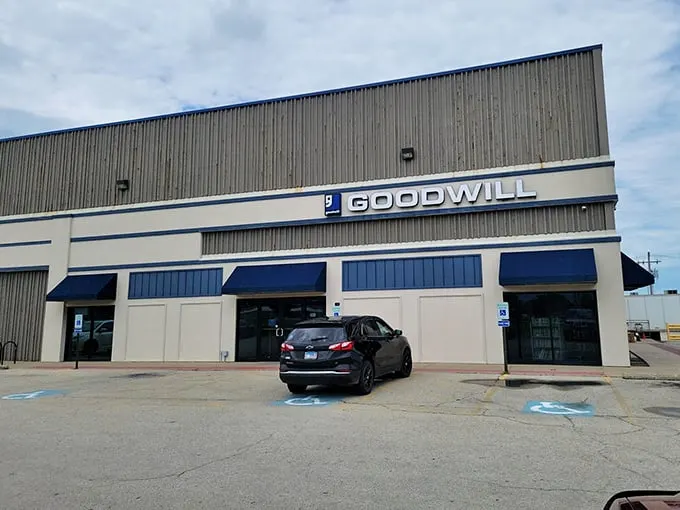 Look at that warehouse-sized treasure chest! This Goodwill's blue awnings promise adventures in bargain hunting.