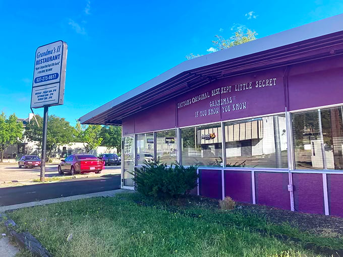 The purple exterior of Grandma's II Restaurant stands out like a beacon of comfort food in Dayton. That sign promises secrets worth discovering!