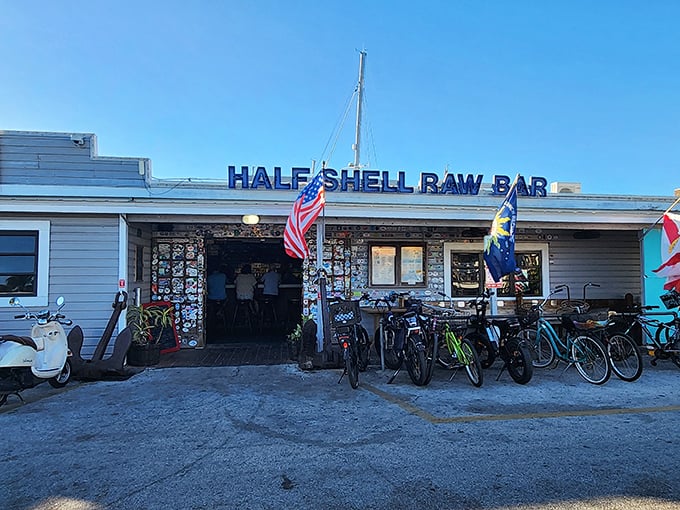 The Half Shell Raw Bar's weathered exterior and bike lineup tell you everything – this is Key West authenticity at its finest.