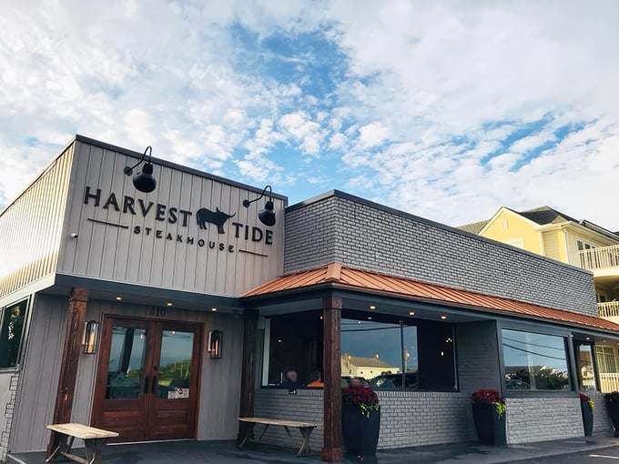 Harvest Tide Steakhouse's modern exterior promises coastal dining magic where land meets sea perfectly.