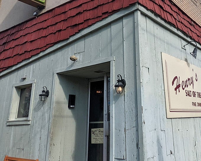 Sometimes the best treasures hide behind the humblest doors - this weathered facade promises culinary gold inside.
