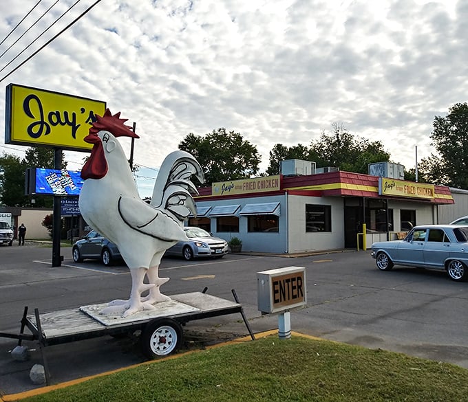 That giant rooster isn't just decoration – it's a promise of the crispy perfection waiting inside.
