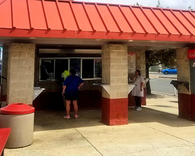 The bright red roof beckons like a lighthouse for hungry souls. This no-frills Philly institution proves greatness doesn't require fancy digs.