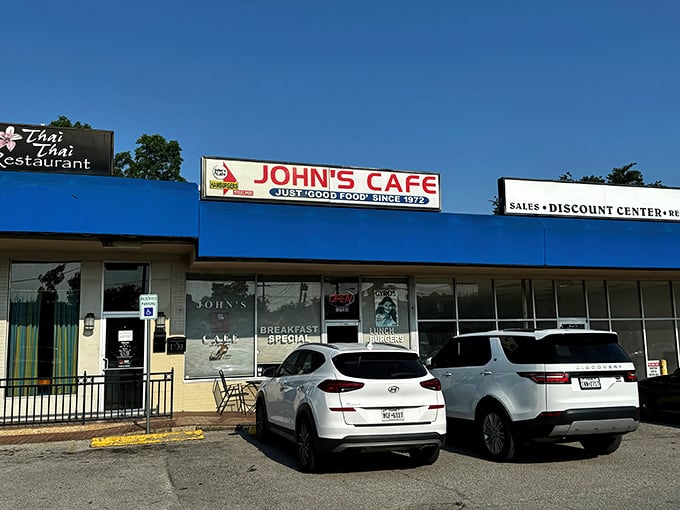 John's Cafe proudly announces "Just Good Food Since 1972" with its bright blue exterior – a promise they've kept for five decades!