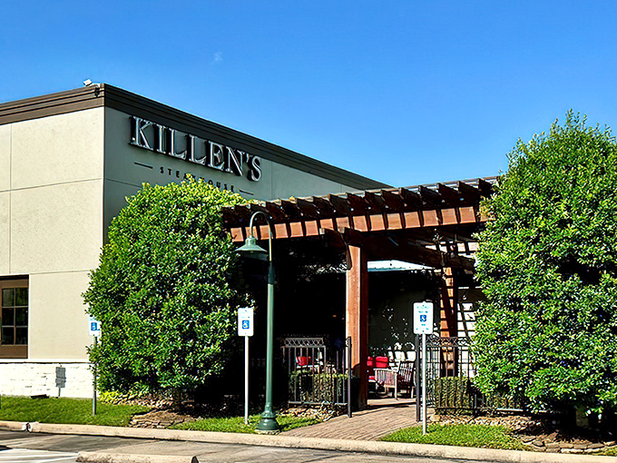 Killen's modest exterior hides a beef lover's paradise. The wooden pergola entrance is like a gateway to steak heaven!