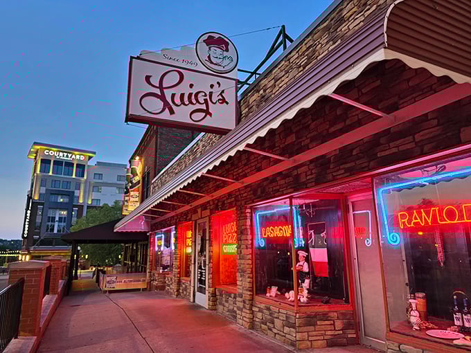 Luigi's glowing neon signs aren't just decoration – they're beacons of hope for the pizza-deprived masses of Akron!