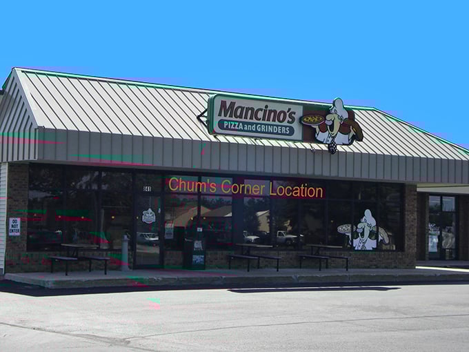 That classic pizza joint exterior promises the kind of comfort food that makes road trips worthwhile.