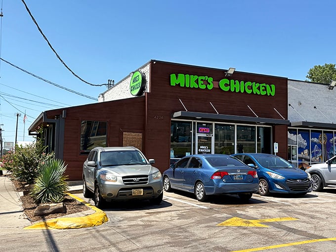 Mike's Chicken: That bright green sign isn't just a beacon—it's a promise of chicken so good you'll forget your table manners.