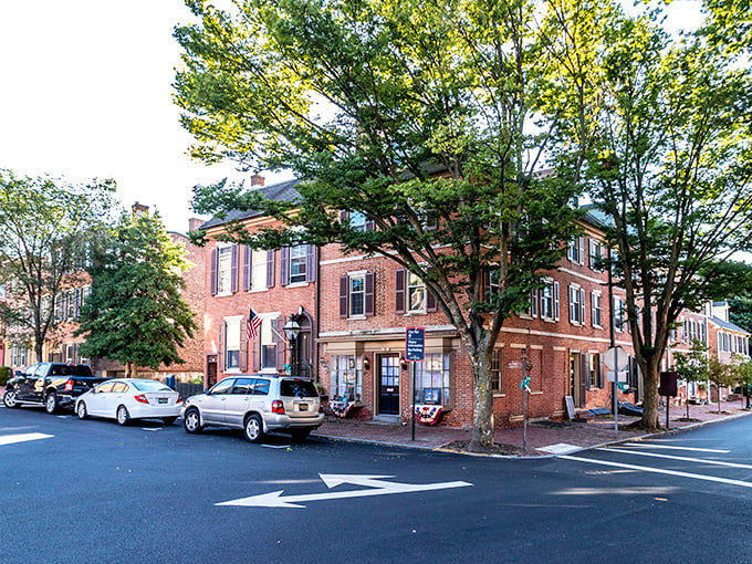 Historic brick buildings line New Castle's charming streets, where colonial America feels just a stroll away.