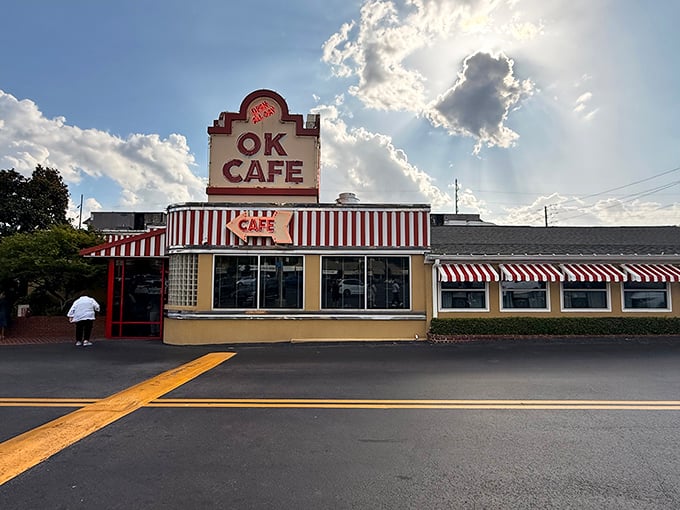 That red and white striped awning practically waves you over like a friendly carnival barker selling happiness.
