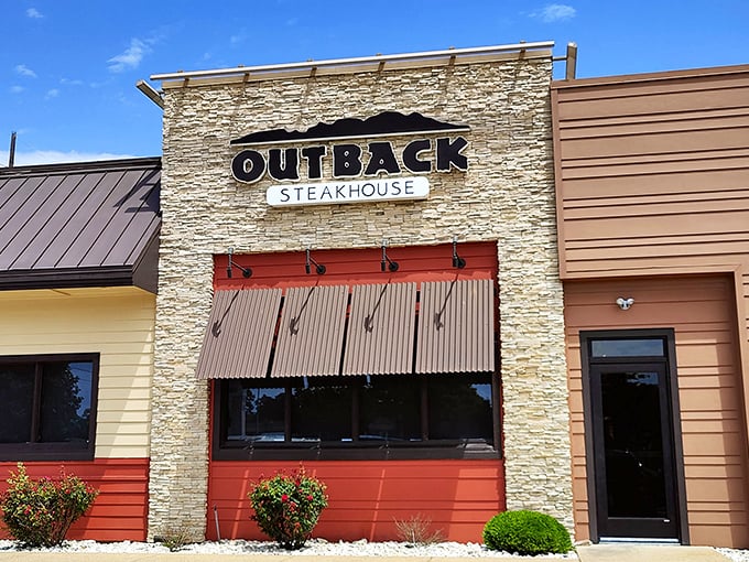That familiar Outback sign promises steaks that'll make you forget all about fancy dining rooms.