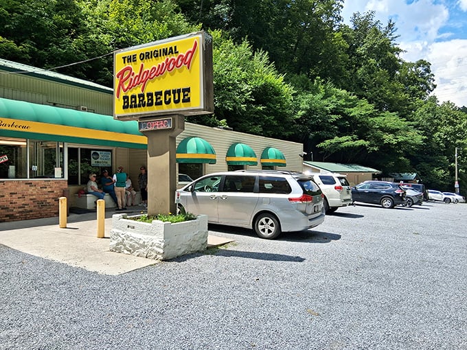 That yellow sign isn't just advertising—it's practically a beacon calling all barbecue pilgrims home.