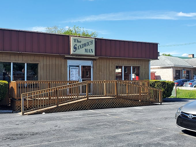 The Sandwich Man's unassuming wooden exterior hides a world of sandwich magic. Like finding a treasure chest disguised as a garden shed!