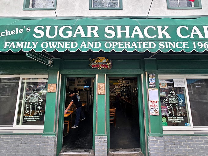 That green awning beckons like a lighthouse for hungry souls seeking breakfast perfection.
