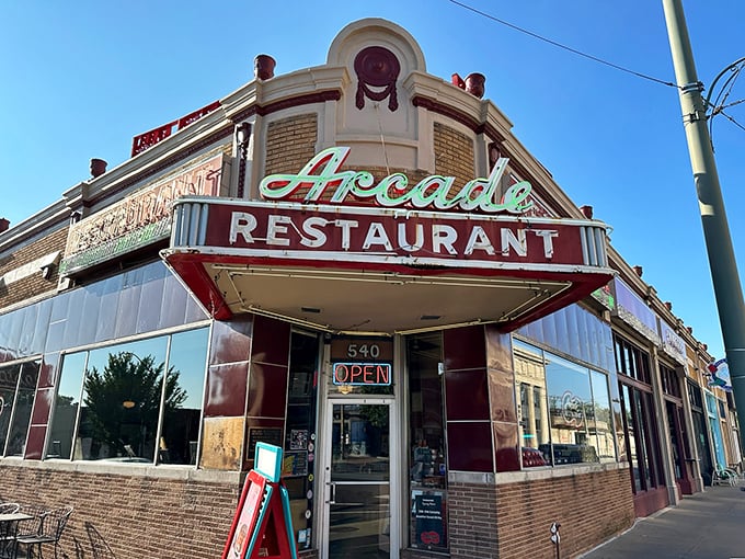 The iconic corner marquee of The Arcade Restaurant glows with vintage charm – Memphis history served with a side of neon nostalgia.