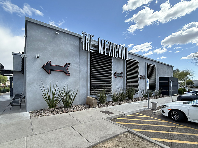 The Mexicano's sleek gray exterior hides a treasure trove of Mexican delights. Those arrow signs aren't lying—this is definitely the direction to deliciousness!