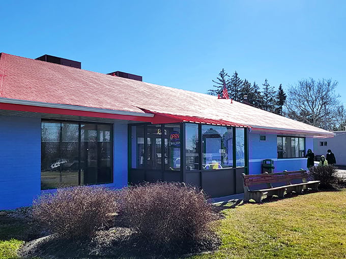 The iconic blue exterior with red trim stands like a beacon of breakfast hope on Wilmington's landscape. Comfort food paradise awaits inside.