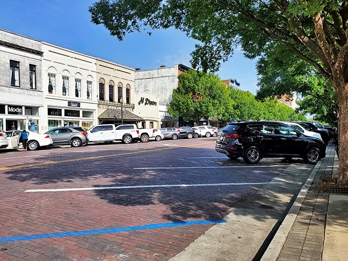 Look at those perfect small-town storefronts - like Mayberry got a fresh coat of paint and better parking!