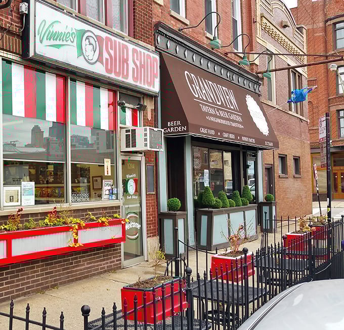 The classic red, white, and green awning of Vinnie's Sub Shop – a Chicago institution where sandwich dreams come true.
