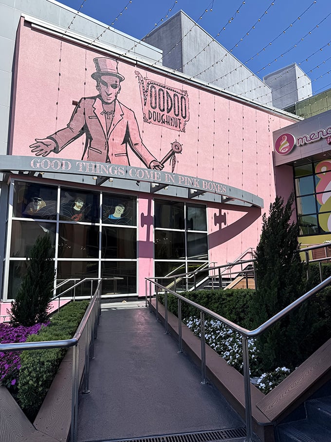 The pink palace of pastry! Voodoo Doughnut's eye-catching exterior promises magical treats inside.