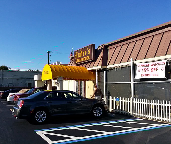 Summer specials and a cheerful yellow canopy? Andre's isn't just a steakhouse—it's Naples' answer to those fancy chain restaurants where you pay extra for the lighting.