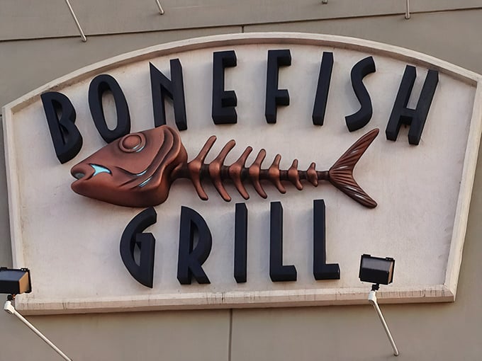That copper fish skeleton sign promises what lies inside – seafood so good, you'll leave nothing but bones!