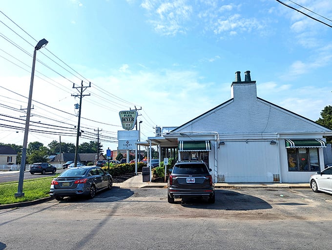 Where breakfast dreams come true. College Park Diner sits proudly under blue skies, a time capsule of American dining tradition.