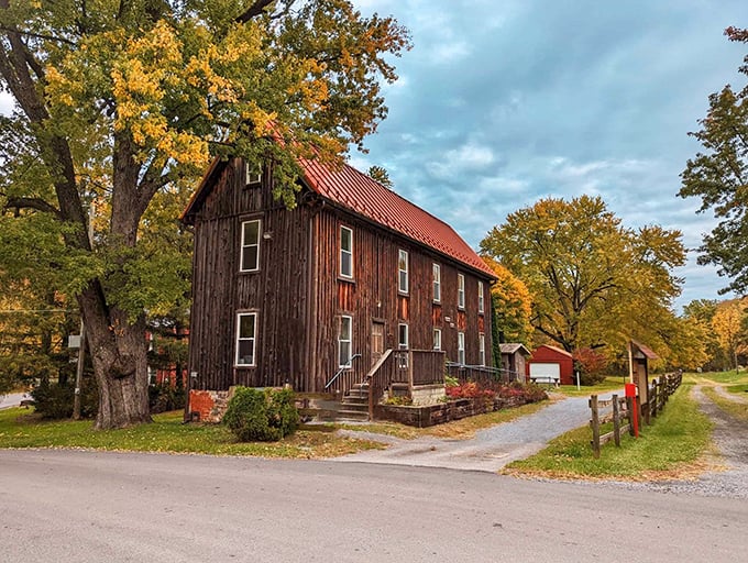This rustic wooden building surrounded by autumn foliage captures Huntingdon's timeless rural charm – like stepping into a simpler era.