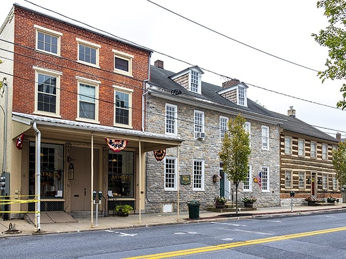Stone buildings stand like patient storytellers, each brick holding decades of small-town secrets.