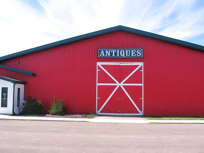 That bright red barn isn't hiding hay – it's packed with vintage treasures waiting for someone to give them a second life.
