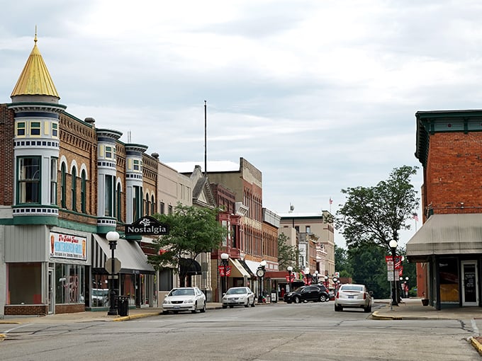 Turrets, brickwork, and mom-and-pop storefronts—Main Street America with a little fairy-tale tower flair.