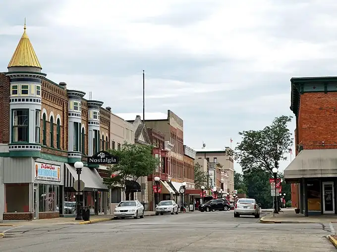 Turrets, brickwork, and mom-and-pop storefronts—Main Street America with a little fairy-tale tower flair.