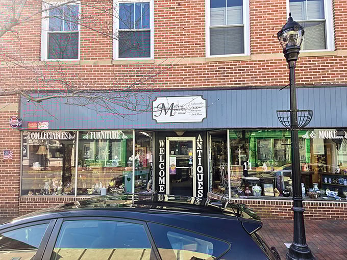 Brick, blue siding, and vintage charm—Milford Memories looks like the kind of place where your grandmother's favorite lamp is waiting for you.