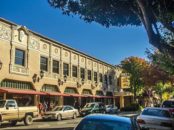 The State Theater marquee beckons like an old friend, promising entertainment in Oroville's ornate downtown time capsule.