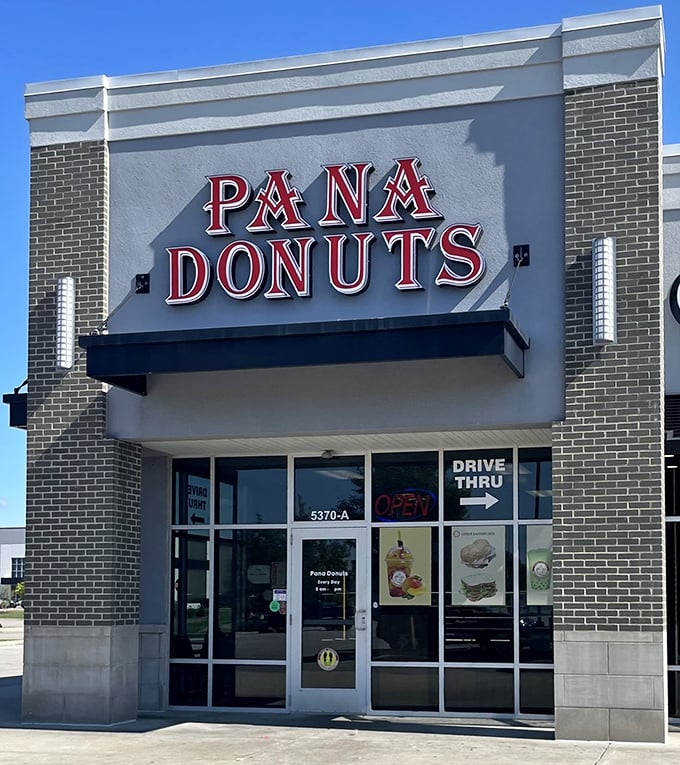 Modern brick meets timeless treats - where drive-through convenience doesn't compromise on that homemade donut magic.
