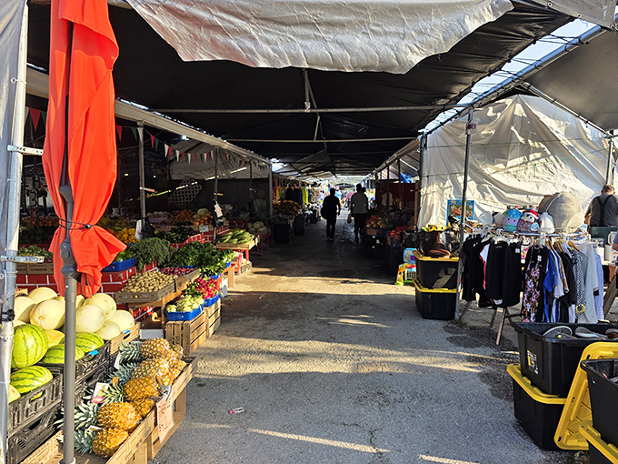Fresh produce meets vintage finds. The covered walkways at Red Barn protect shoppers while they browse an endless array of goods.