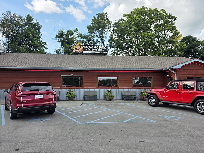 Simple red brick exterior hiding smoky secrets that would make your grandmother's Sunday dinner jealous of the competition.