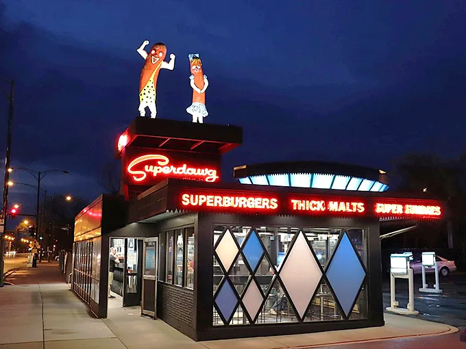 When neon meets nostalgia, magic happens—this retro drive-in glows like a beacon for hungry souls seeking comfort.