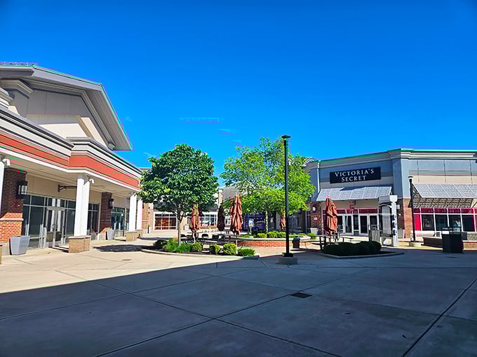 Open-air retail therapy at its finest, complete with benches for weary wallet recovery.