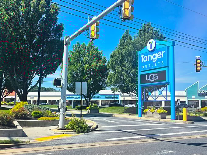 That blue Tanger sign beckons like a lighthouse for deal-seekers navigating the vast ocean of retail possibilities ahead.