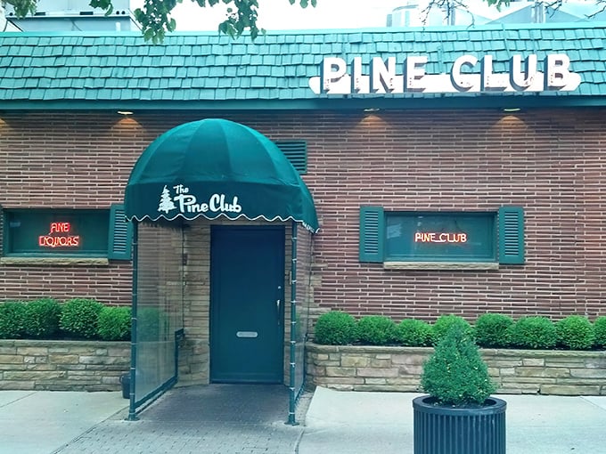 The Pine Club's brick exterior and green awnings aren't just charming—they're a beacon for steak lovers across Ohio. Classic never goes out of style!