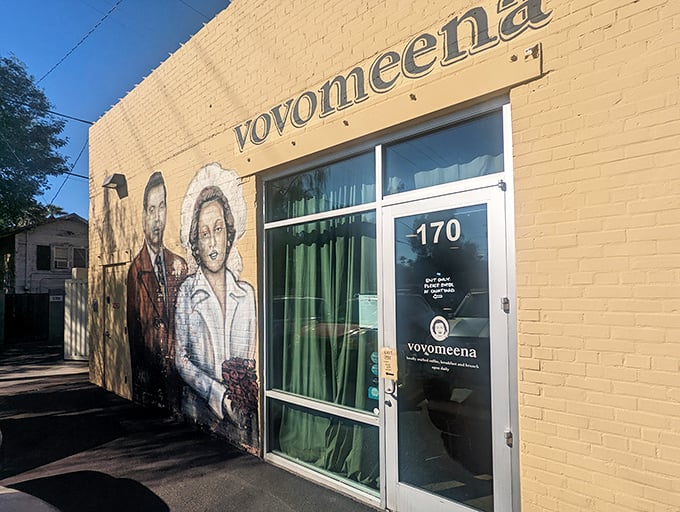 The charming yellow brick exterior features a nostalgic mural that sets the tone before you even step inside—this isn't your average breakfast joint.