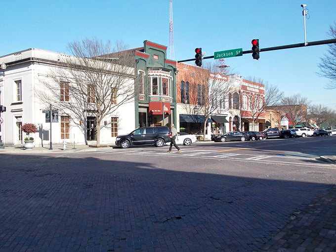Main Street magic where brick buildings whisper stories and traffic lights actually turn green when you need them. 
