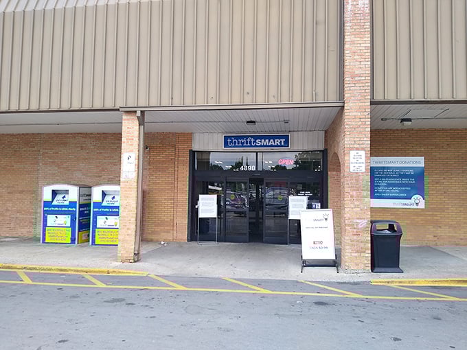 Those donation bins stand guard like blue sentinels, ready to transform your castoffs into someone's treasure.