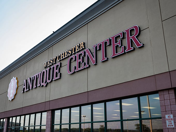 That bold red signage isn't just for show—it's like a lighthouse guiding vintage-loving ships to safe harbor at West Chester Antique Center.