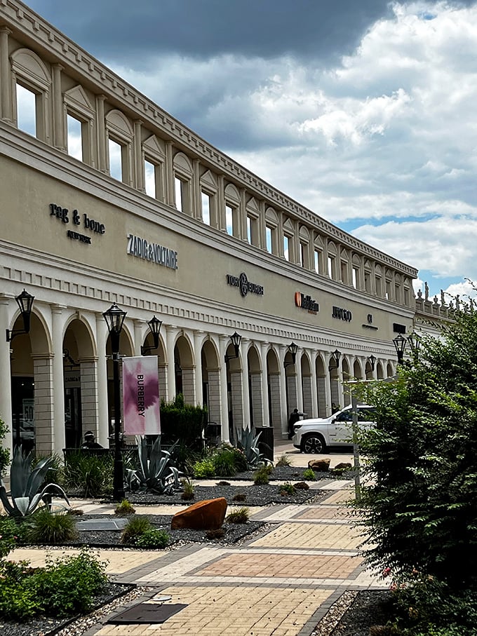 Architectural grandeur that says "your credit card is about to have an adventure" – rag & bone, Zara, and other temptations await beneath those elegant arches.