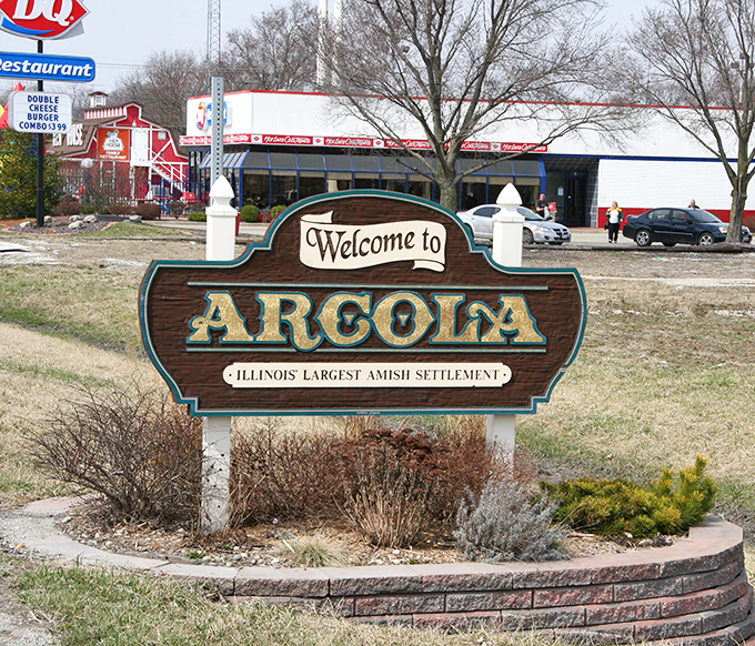 The welcome sign tells you everything you need to know – you've just entered Illinois' largest Amish settlement, where tradition meets small-town charm.