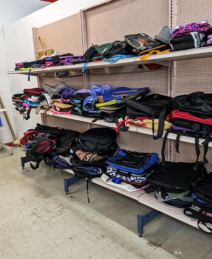 A colorful chaos of handbags awaits new owners – from practical totes to glitzy evening clutches, each with stories from their previous lives.