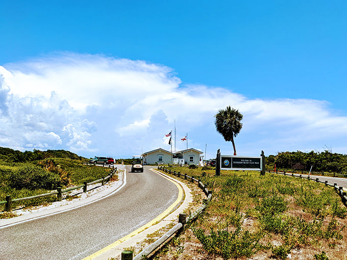 The entrance to Henderson Beach State Park feels like the gateway to a simpler time, when "refresh" meant ocean breezes, not browser tabs.