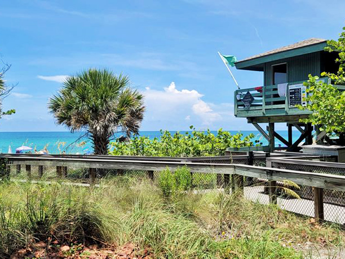 The boardwalk here feels like a VIP entrance to paradise, minus the velvet rope.